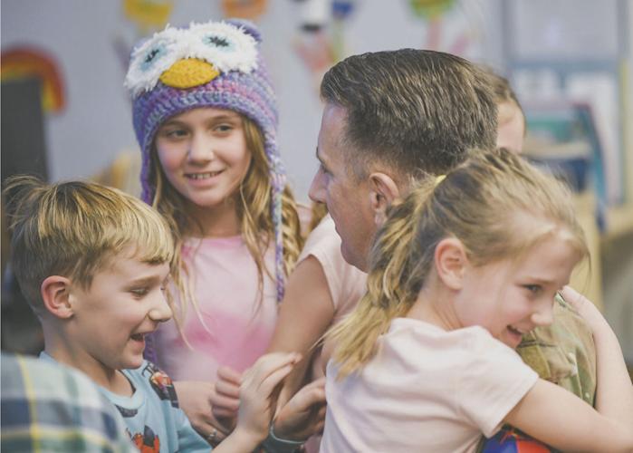 Returning U.S. Army major surprises his children at school | Local News ...