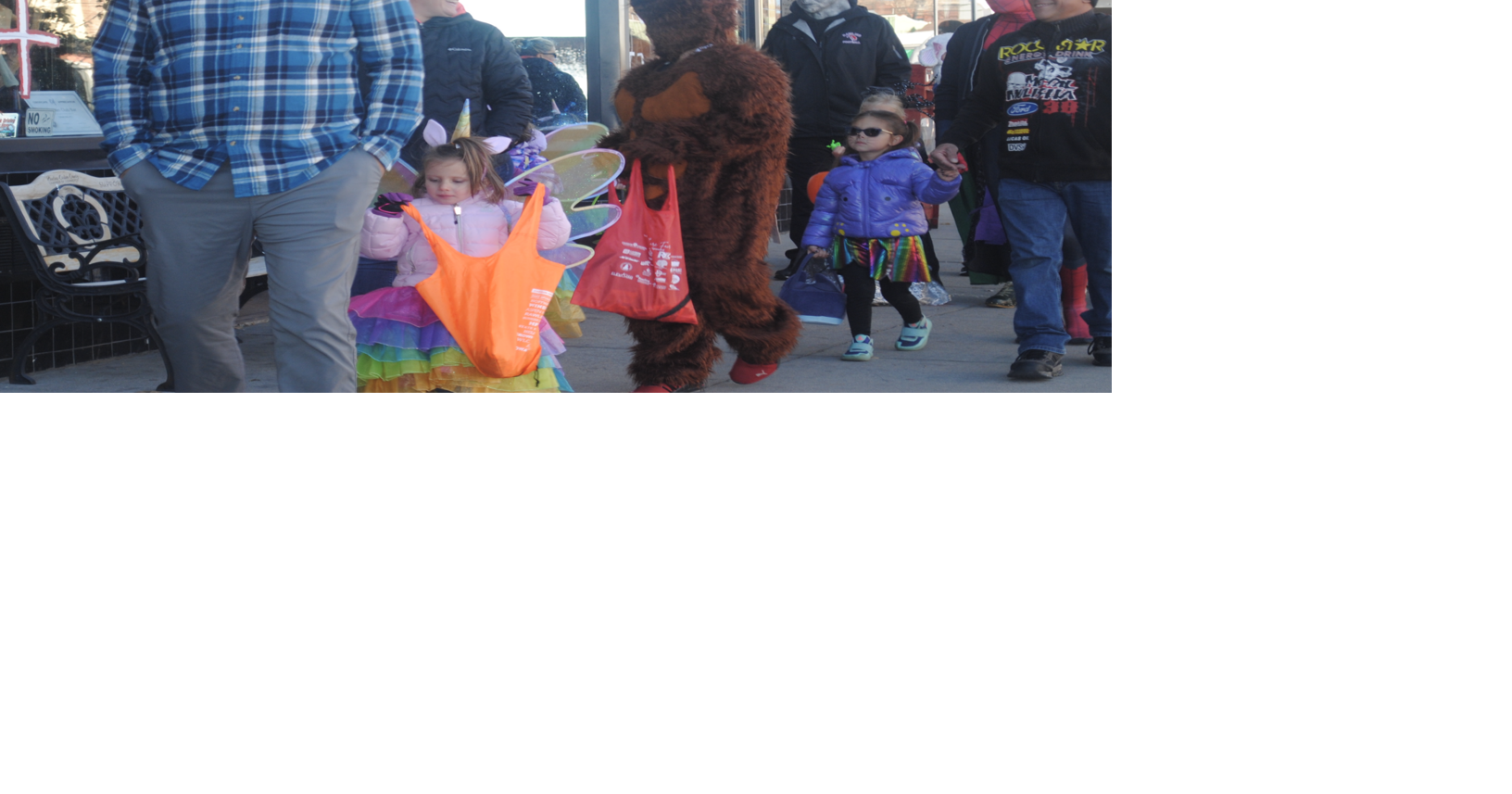 Costume-clad kids descend on Trick or Treat on Downtown Streets in ...
