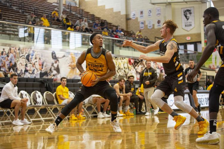 Junior Xavier DuSell brings magic on and off the court | University of ...