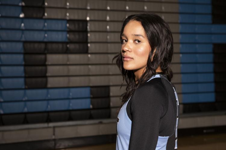 Taliah Morris and Maggie Madsen's three wins helped East win team state ...