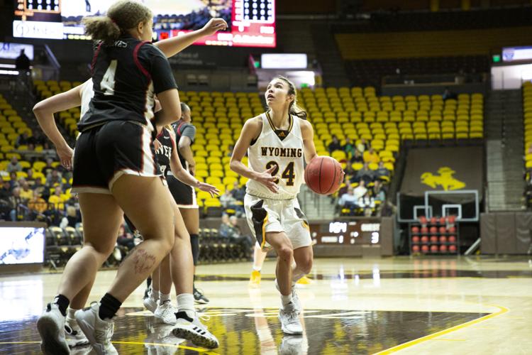 University of Wyoming women's basketball beats the University of Denver ...