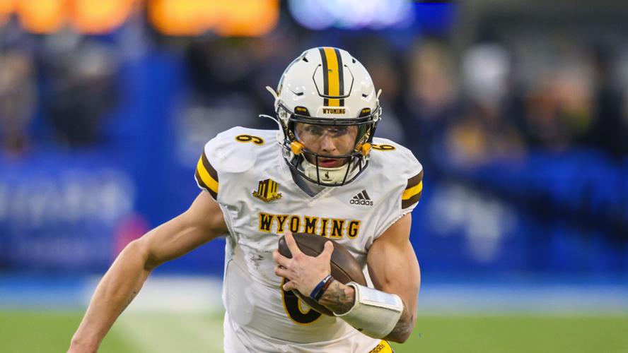 UW quarterback Andrew Peasley embraces fatherhood in final season ...