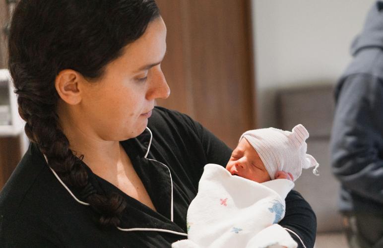 Perfect timing: Evans family begins new year with meaningful addition ...