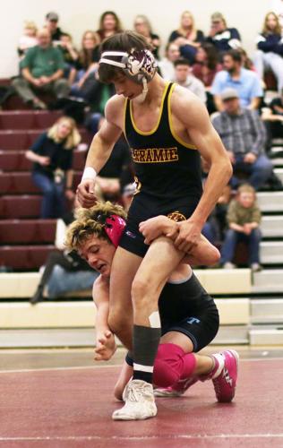 Cheyenne East wrestling rolls past Laramie | Cheyenne East ...