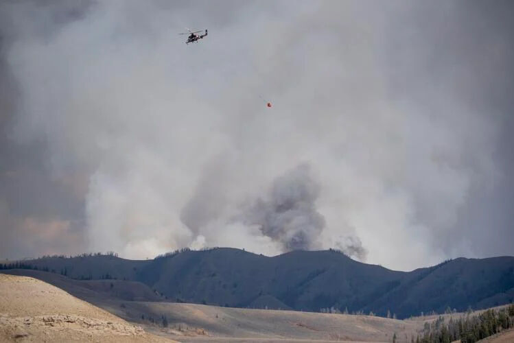 Firefighters wrapping homes, laying hose to protect Gros Ventre from ...