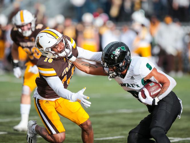 Cowboys close regular season with blowout loss to Hawaii | Football ...