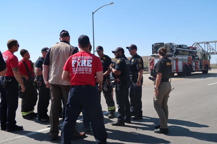 Cheyenne man climbs down from bridge after five hours of negotiations ...