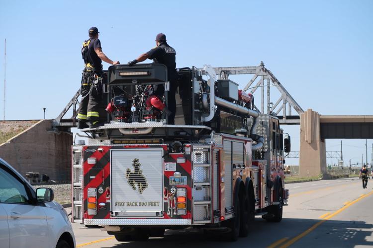 Cheyenne man climbs down from bridge after five hours of negotiations ...