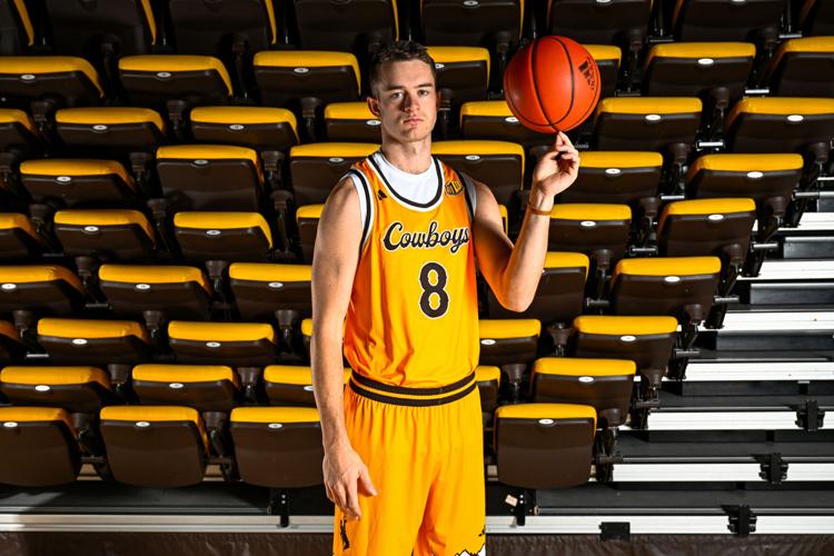 Wyoming forward Cole Henry not letting injuries slow him down ...