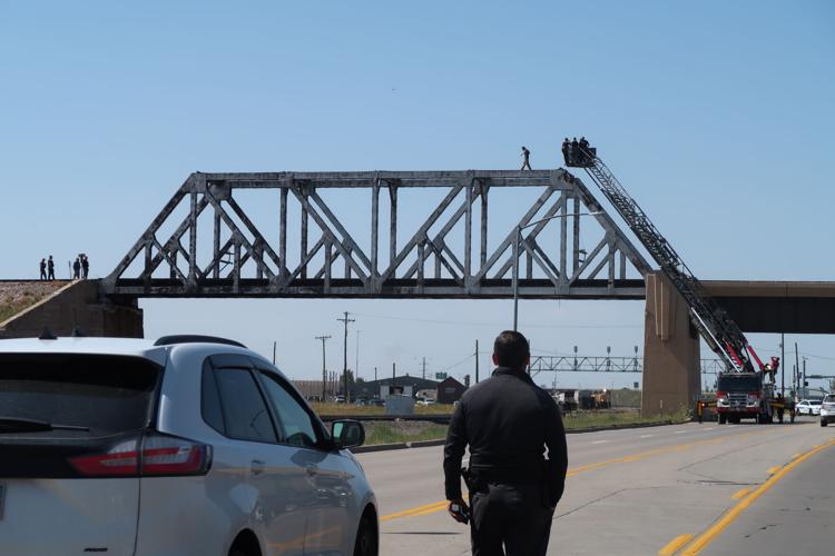 Cheyenne man throws objects at cars from a railroad bridge, case bound ...
