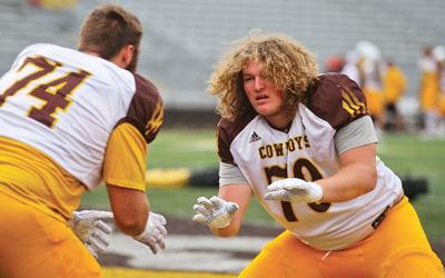 Logan Harris up for challenge in switch from center to guard ...