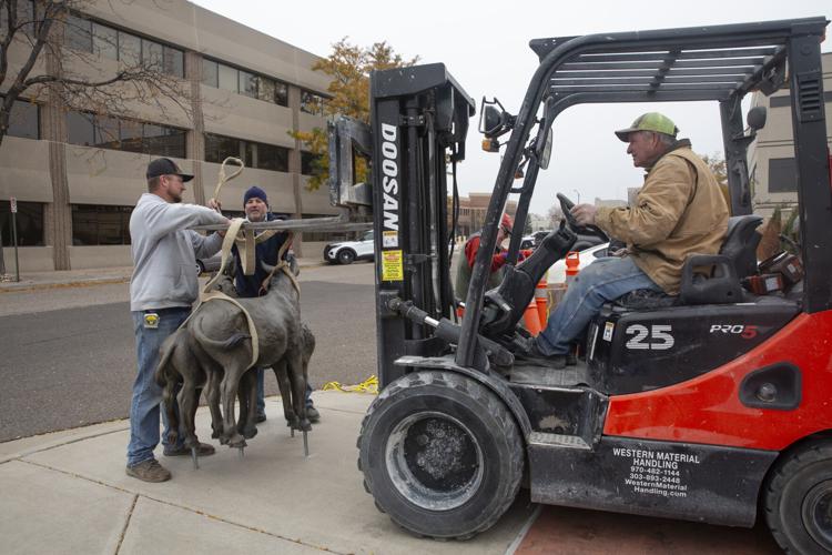 Bronze statue installation, "Swat Team" | Gallery | wyomingnews.com