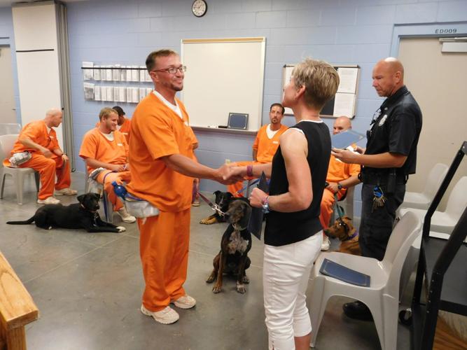 Inmates in dog training program receive recognition | State ...