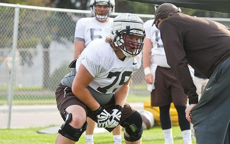 Torrington's Logan Harris to start at center for Cowboys as a true ...