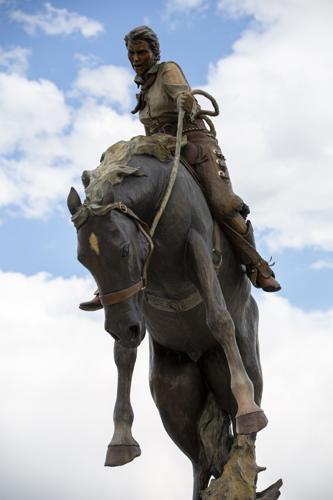 CFD officials unveil Year of the Cowgirl statue at Frontier Park ...