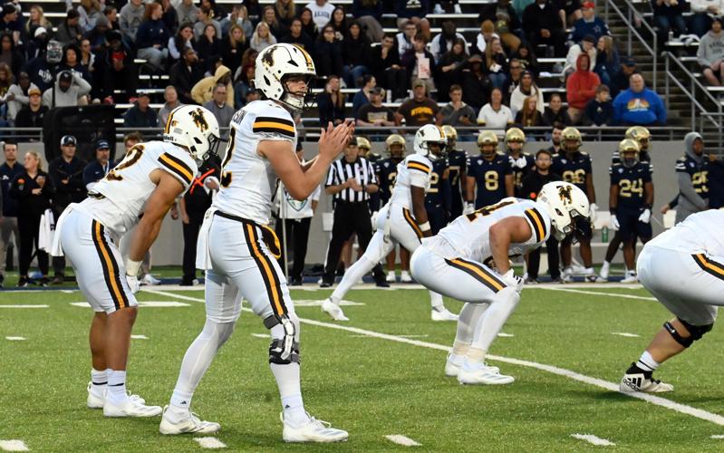 Cowboys hold off Zips to open season on the road | University of ...