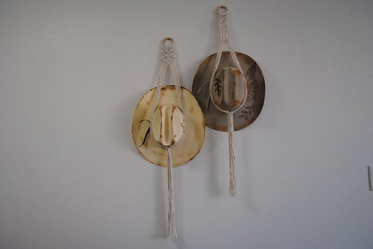 A tip of the cap: Rawlins artist Taya Morrell provides customers with ...
