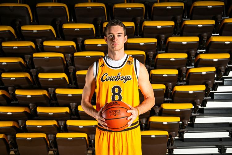 Wyoming forward Cole Henry not letting injuries slow him down ...