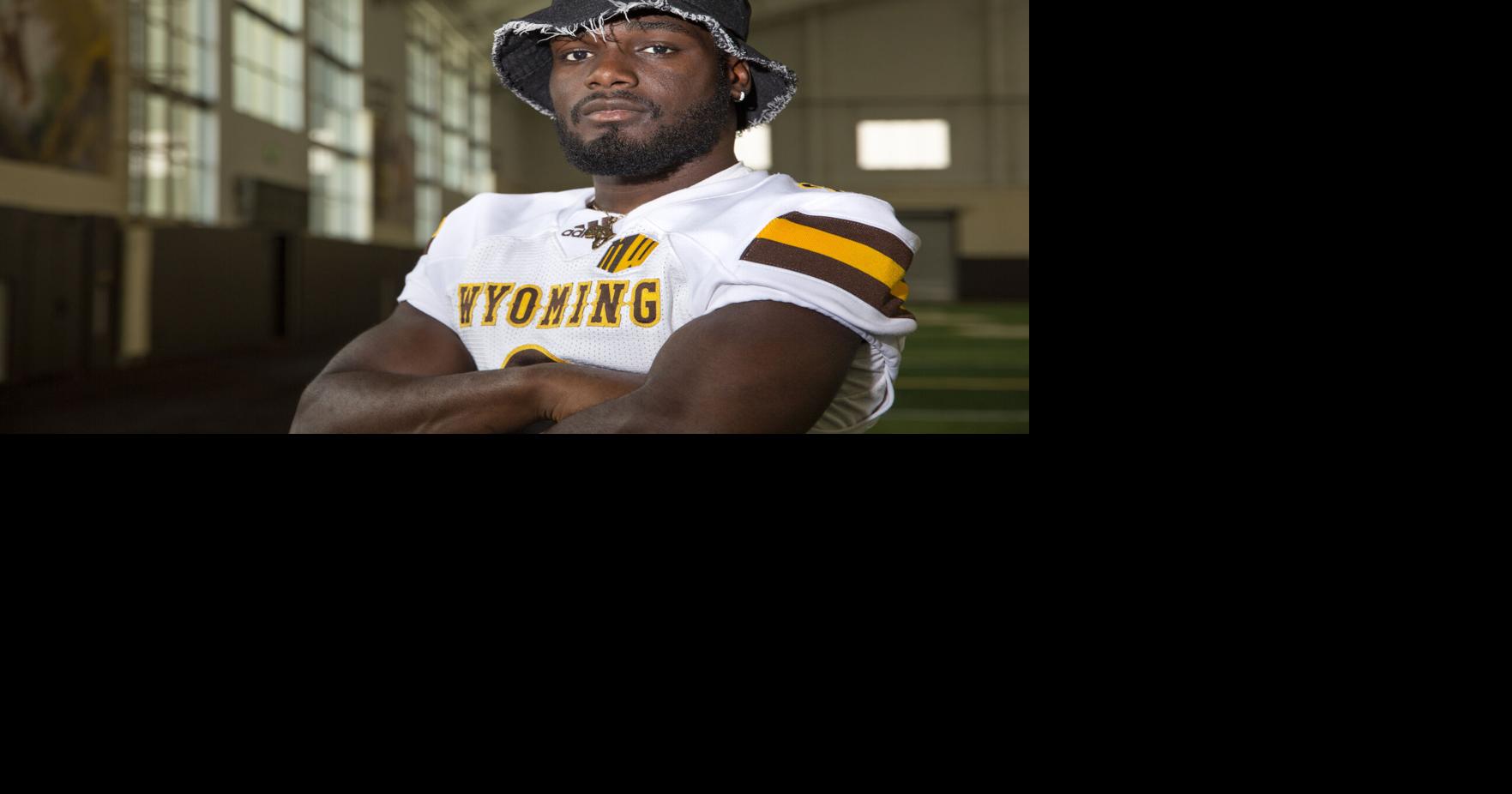 Titus Swen aims to inspire others as UW’s feature back | University of ...