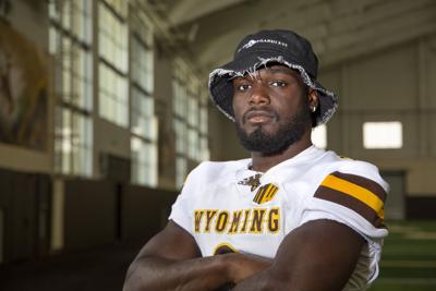 Titus Swen aims to inspire others as UW’s feature back | University of ...