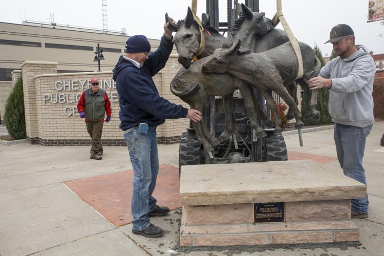 Bronze statue installation, "Swat Team" | Gallery | wyomingnews.com