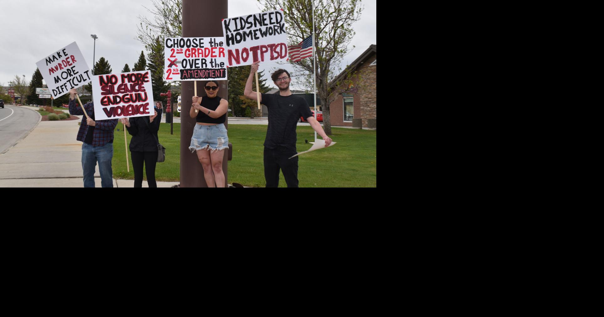 'It's tiring:' Rock Springs residents protest gun violence in wake of ...
