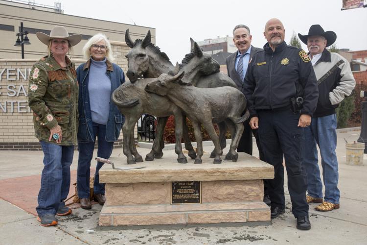 Bronze statue installation, "Swat Team" | Gallery | wyomingnews.com