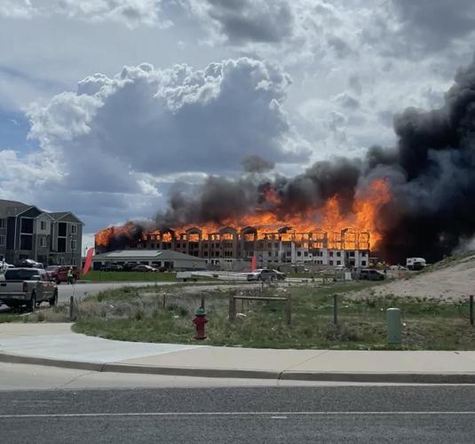 Massive blaze destroys apartment building under construction, no ...