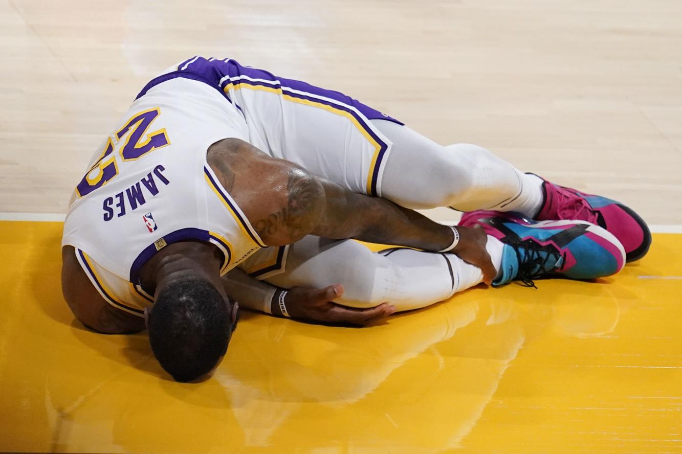 LeBron James sprains right ankle in loss, out indefinitely | Sports ...