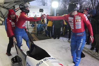 Swiss bobsled athlete thrown to ice and hit by sled | | wyomingnews.com