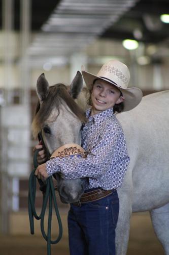 Local teen, wild mustang quickly build bond through training program ...