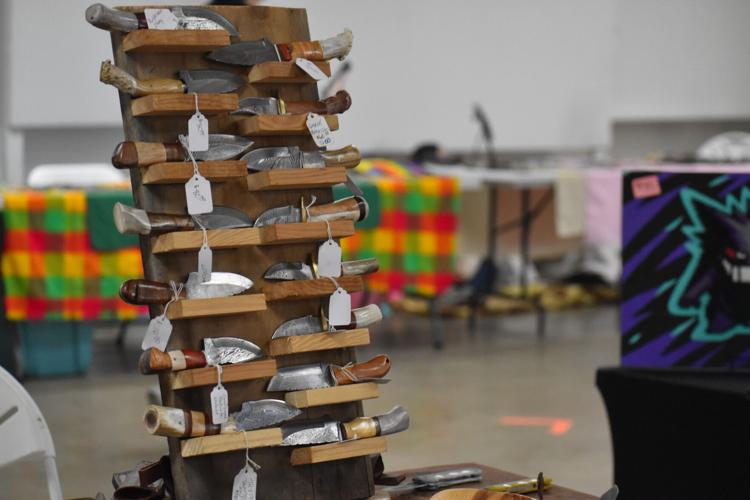 Local wood worker Travis Hart shows off work at vendor showcase ...