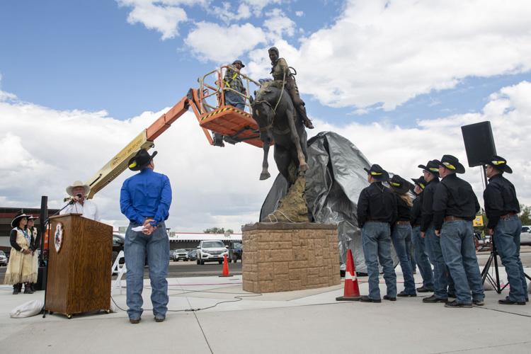 CFD officials unveil Year of the Cowgirl statue at Frontier Park ...