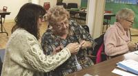 Busy Hands members learn to make rag rugs | Community | wyomingnews.com
