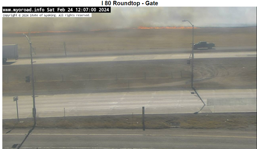 Firefighters battle large grass fire west of Cheyenne, reportedly ...