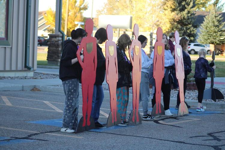 End the Silence: Community gathers for YWCA's inaugural purple glow run ...