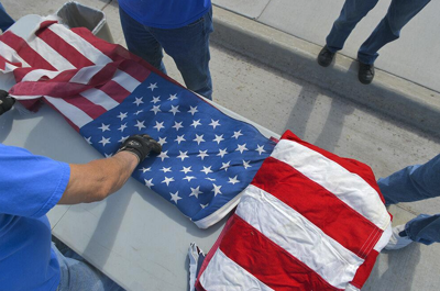 Respecting the flag: Properly retiring flags is a community tradition ...