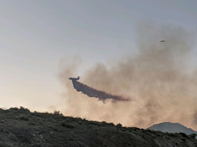 Wildfire still burning off Wyoming Highway 34 northeast of Laramie ...