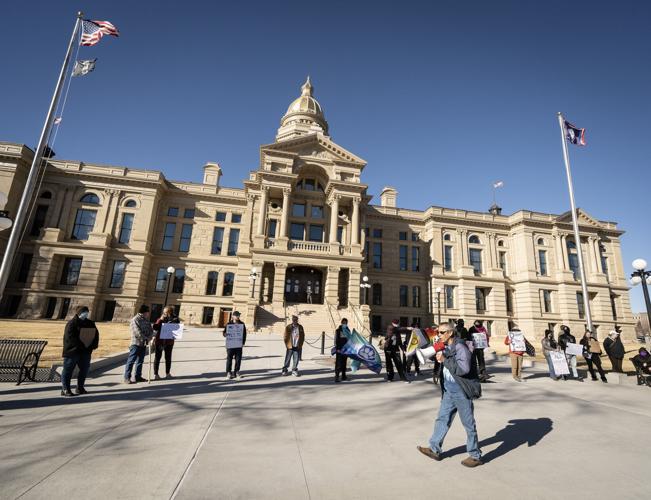 Anti-Trump protesters demonstrate outside Wyoming State Capitol | Local ...
