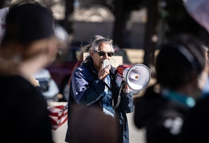 Anti-Trump protesters demonstrate outside Wyoming State Capitol ...