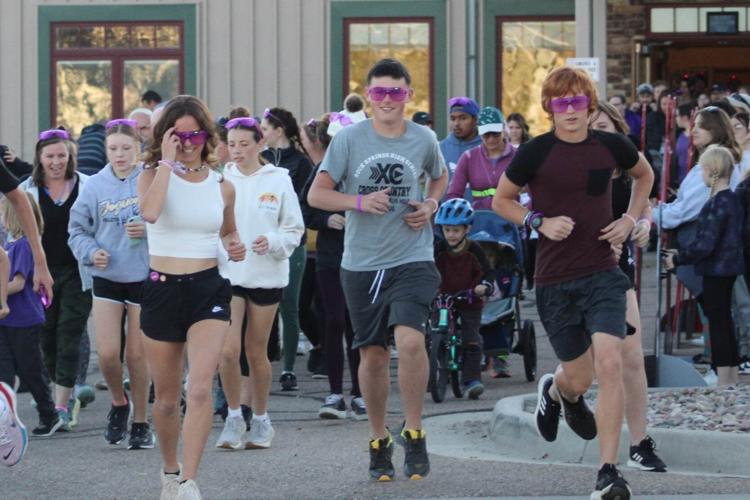End the Silence: Community gathers for YWCA's inaugural purple glow run ...