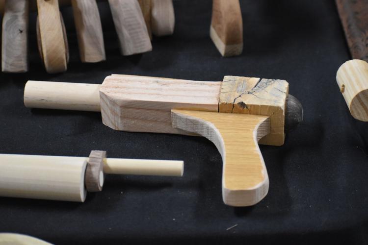 Local wood worker Travis Hart shows off work at vendor showcase ...