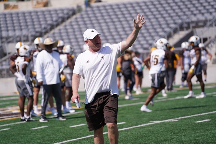 Jay Sawvel taking the baton from Craig Bohl | University of Wyoming ...