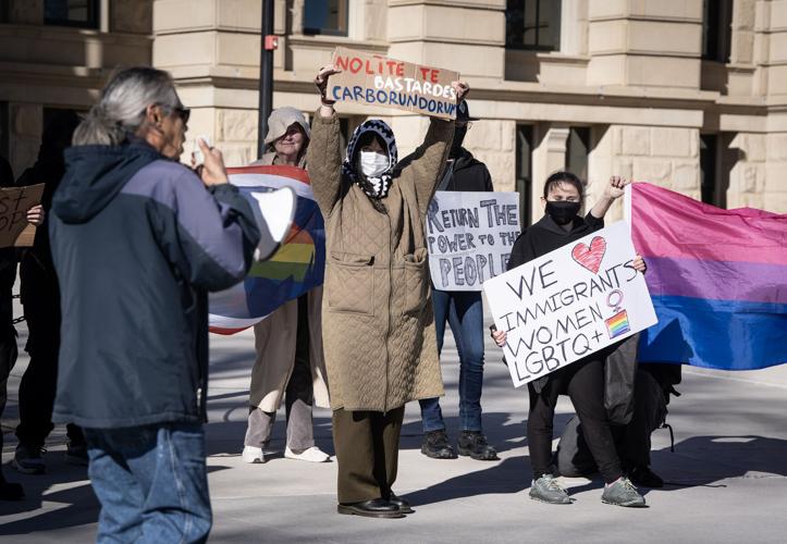 Anti-Trump protesters demonstrate outside Wyoming State Capitol | Local ...