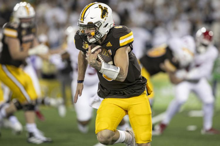 UW quarterback Andrew Peasley embraces fatherhood in final season ...