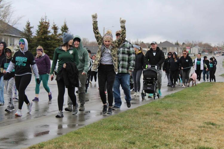 ‘They didn't choose to be victims’: Supporters brave the cold to spread ...