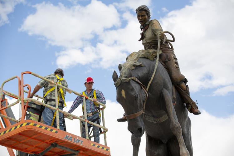 CFD officials unveil Year of the Cowgirl statue at Frontier Park ...