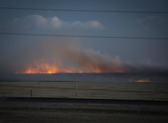Firefighters battle large, fast-moving grass fire south of Cheyenne ...