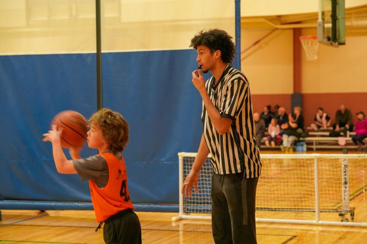 Cowboy hoops' players referee youth basketball games in Laramie ...