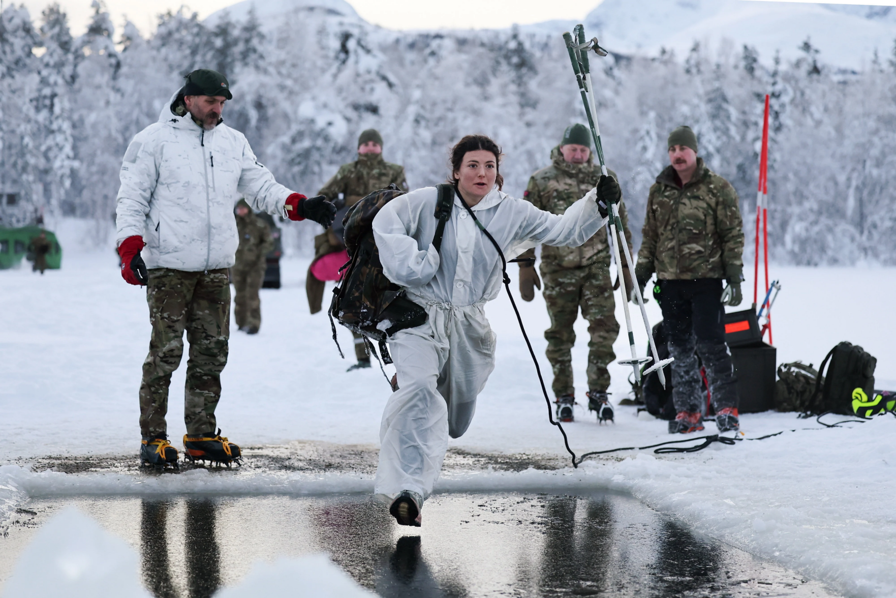 British troops plunge into icy Arctic waters as tensions rise over ...